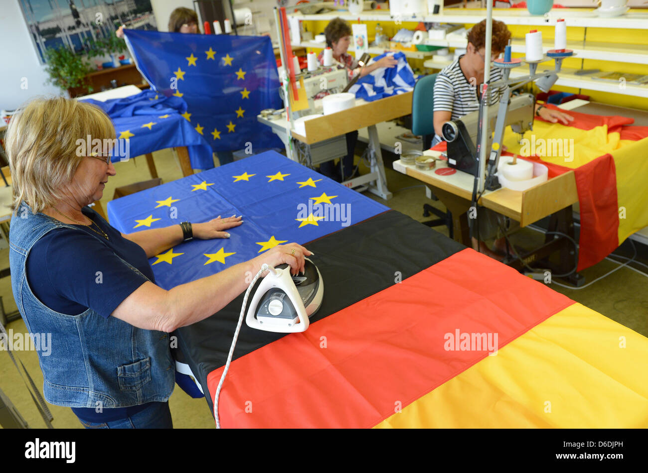 ILLUSTRATION - An illustrated picture shows an employee of flag ...