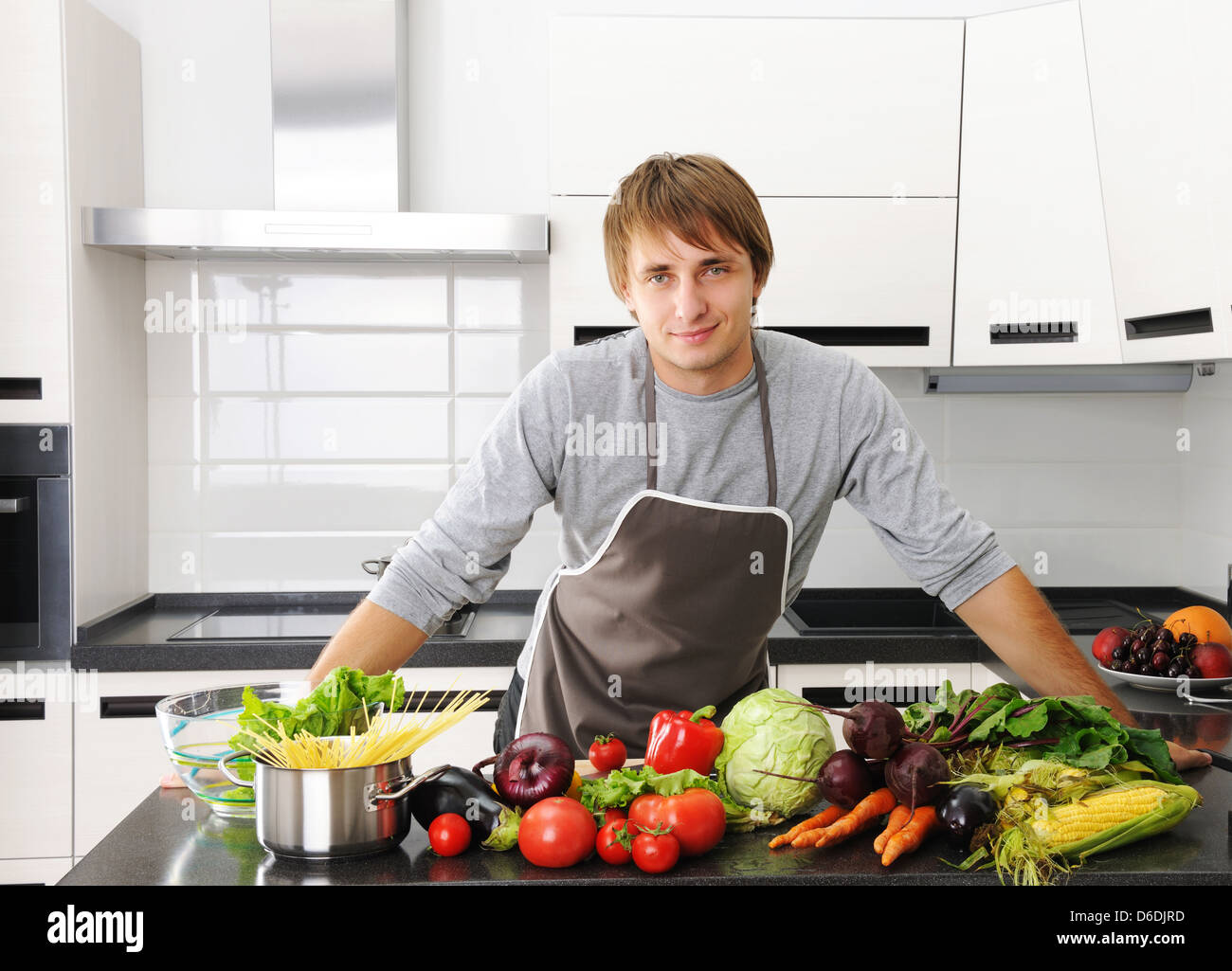 Man in kitchen Stock Photo - Alamy