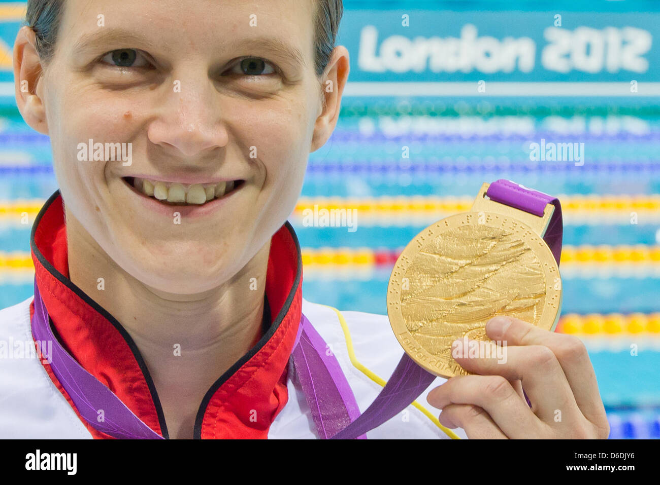 Daniela Schulte of Germany shows her gold medal after the Women's 400m ...