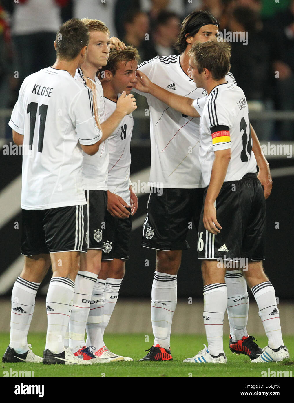 Germany's Mario Götze (C) celebrates with his teammates Miroslav Klose ...