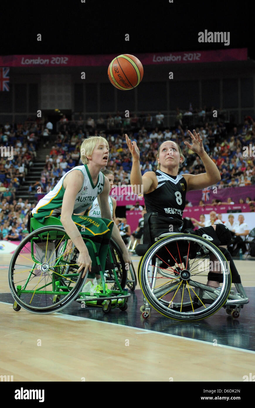 Annika Zeyen (r) of Germany tries to score next to Amber Merritt of ...