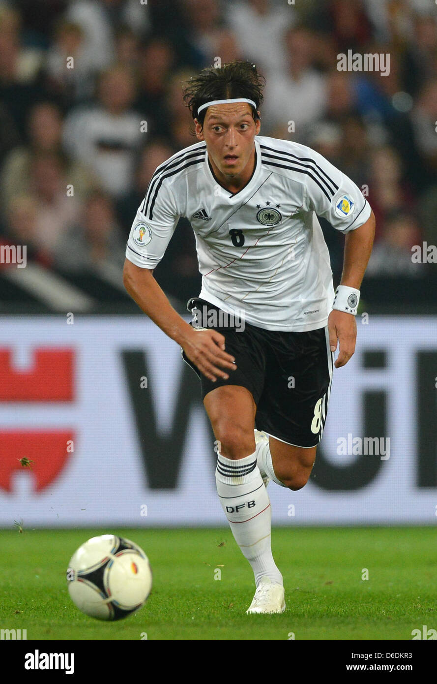 Germany's Mesut Ozil dribbles the ball during the Group C FIFA World ...