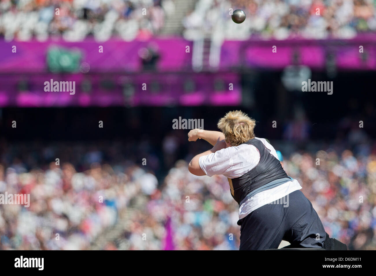 Ilke Wyludda of Germany competes in the Women's Shot Put - F57/58 Final ...