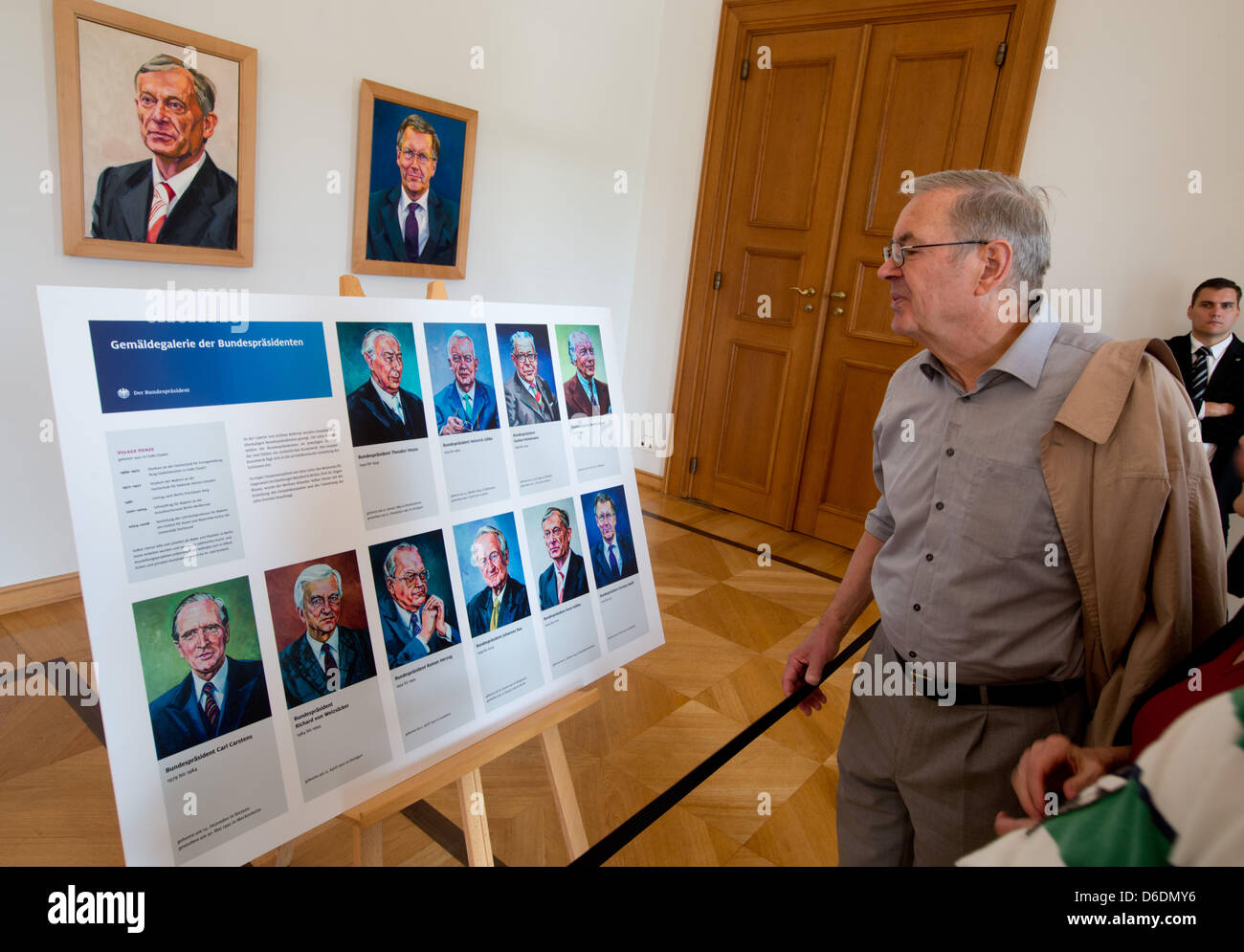 Visitors view portraits of former German Presidents in the picture ...