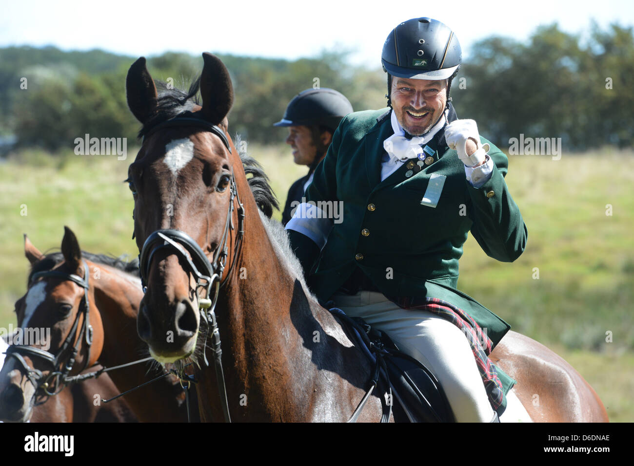 Actor Till Demtroeder takes part in a drag hunt near Putbus on Ruegen ...