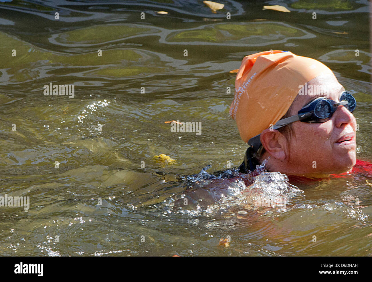 Dutch Princess Maxima swims through the canals of Amsterdam, The ...