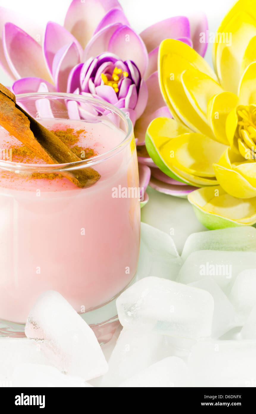 Pudding dessert with lilies background Stock Photo - Alamy