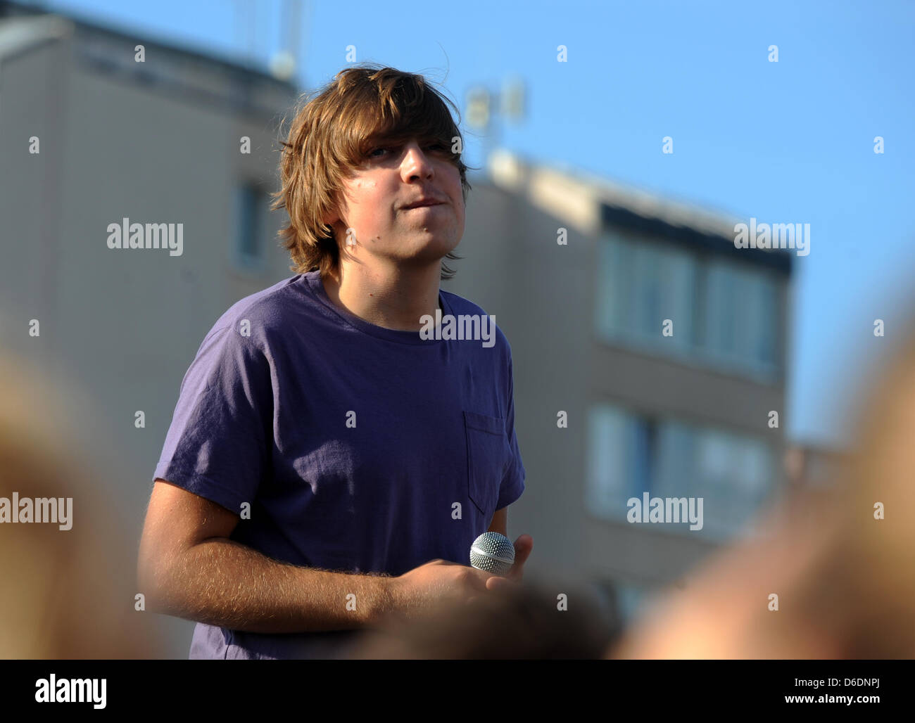 Singer Philipp Poisel performs on top of a house during the 'ADD - Auf ...