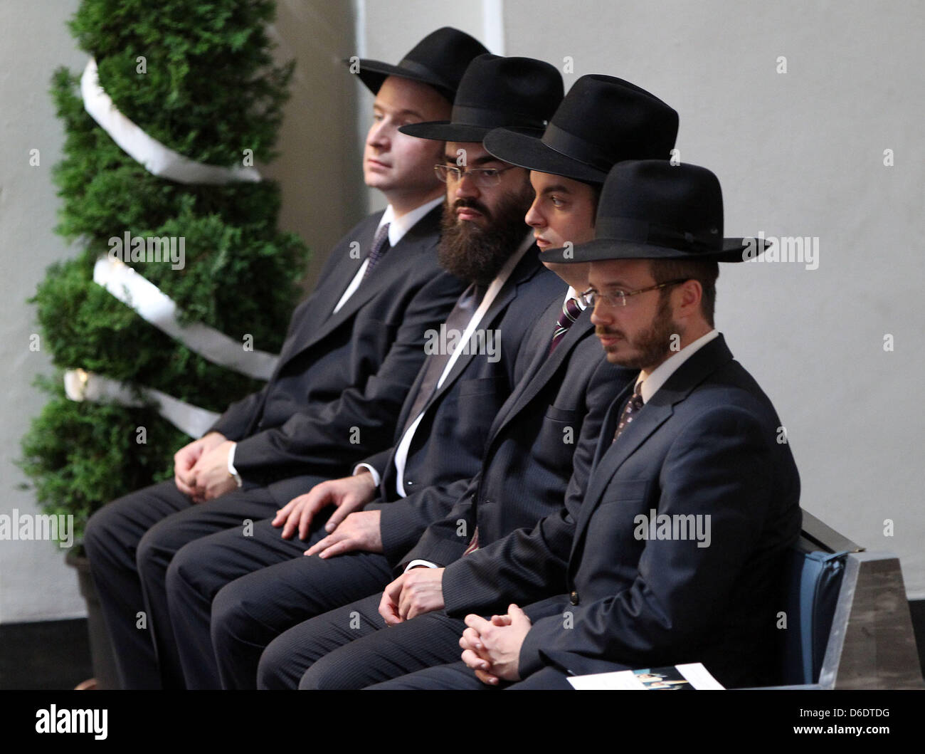 Rabbis Daniel Fabian (L-R) from Israel, Reuven Konnik from Ukraine ...
