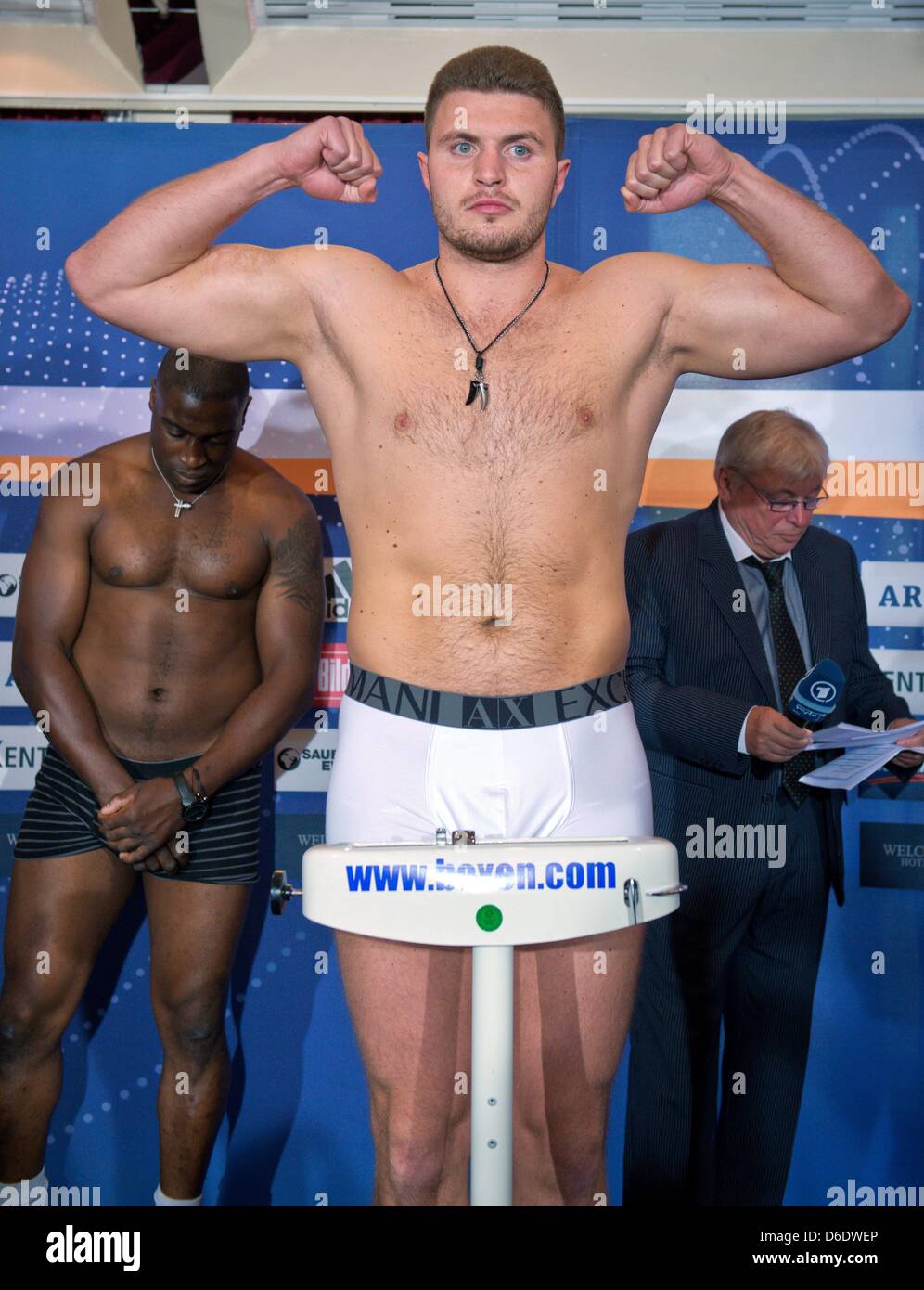 German heavyweight boxer Edmung Gerber poses while his British opponent ...