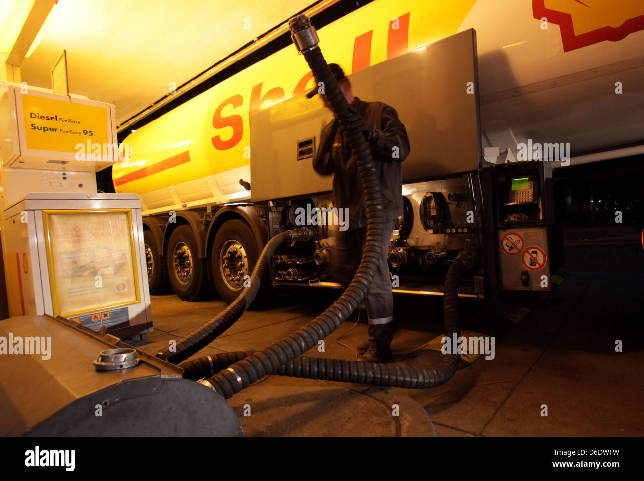 A gas truck delivers gas to a Shell gas stationi in Hamburg, Germany ...