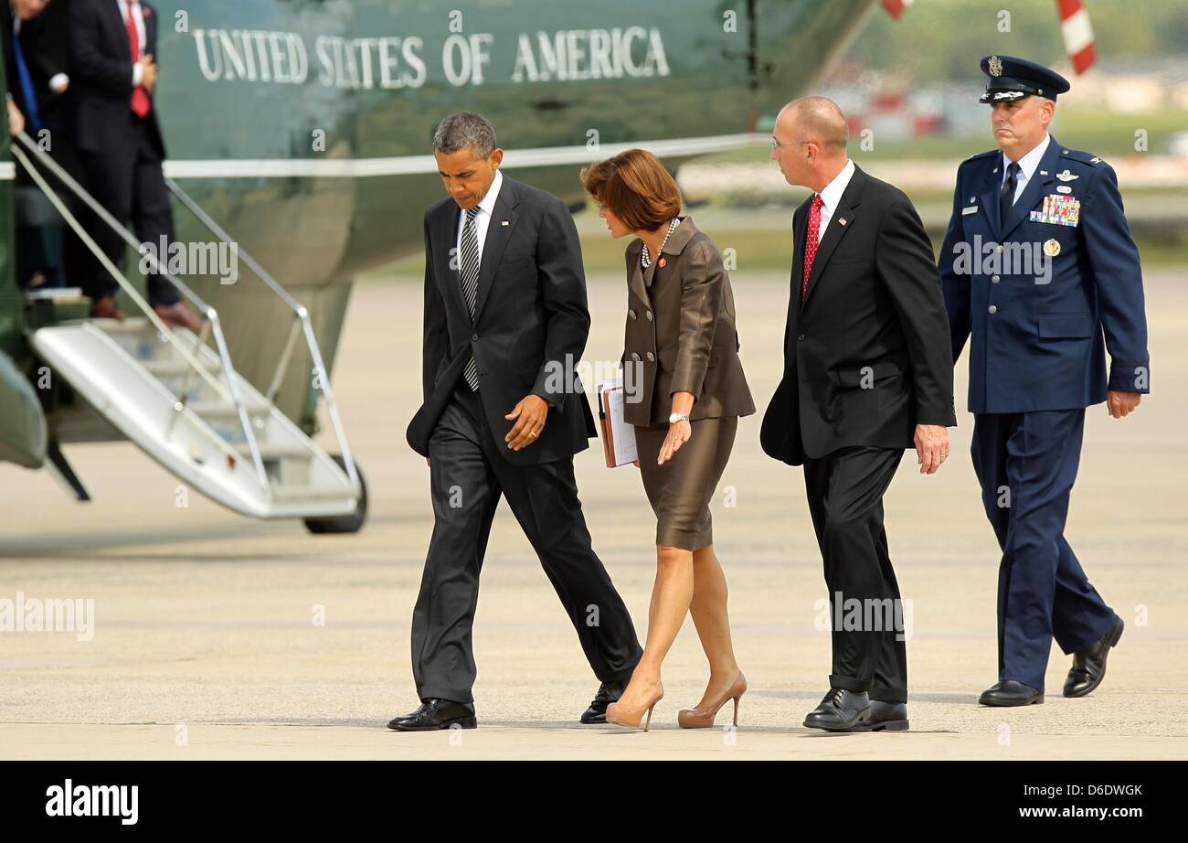 United States President Barack Obama is greeted by Colonel Michael ...