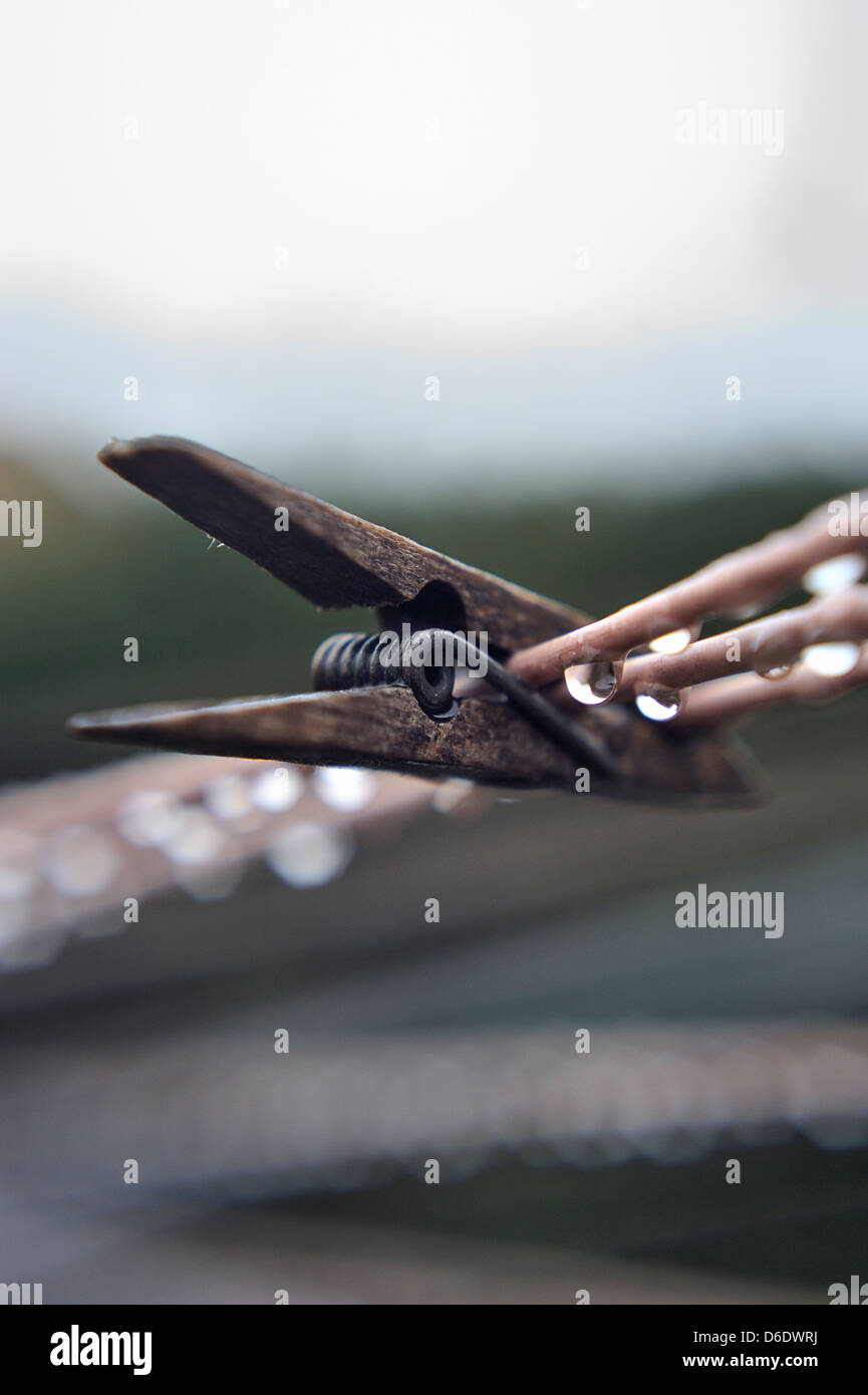 Wet Clothes Pegged To Washing Line High Resolution Stock Photography ...
