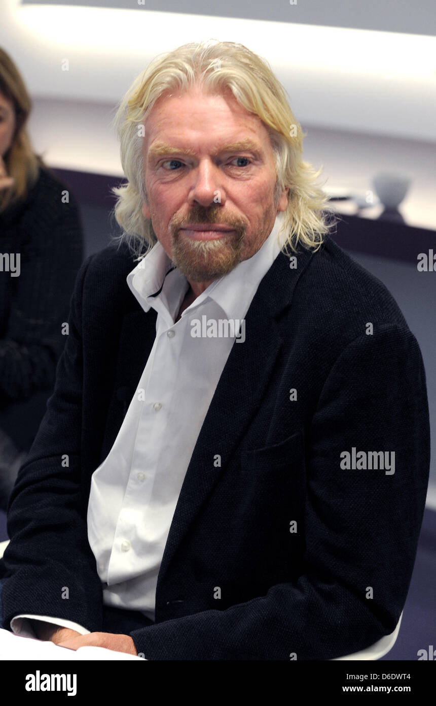 British billionaire Sir Richard Branson attends a talk with ...