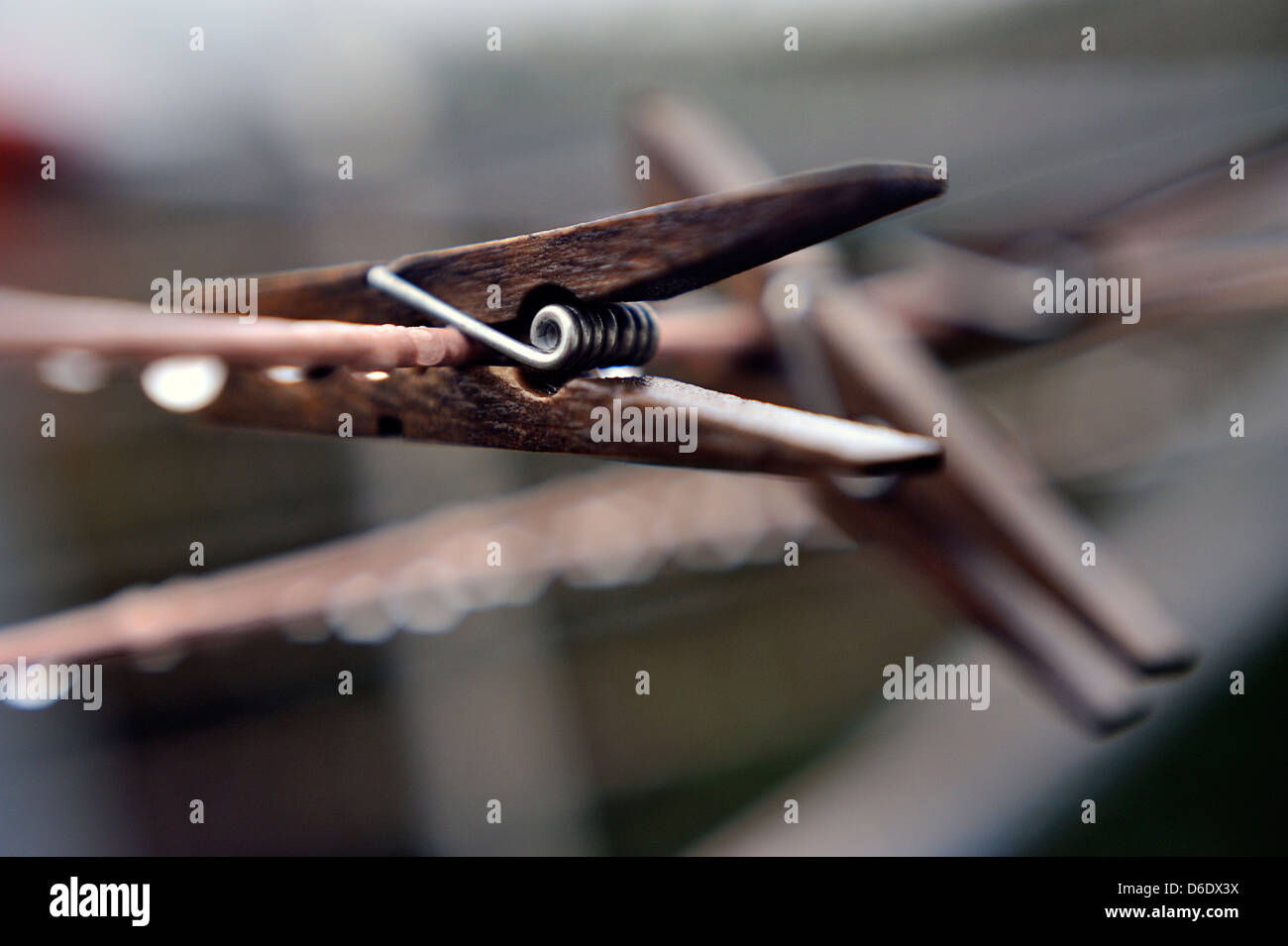 Wet Clothes Pegged To Washing Line High Resolution Stock Photography ...