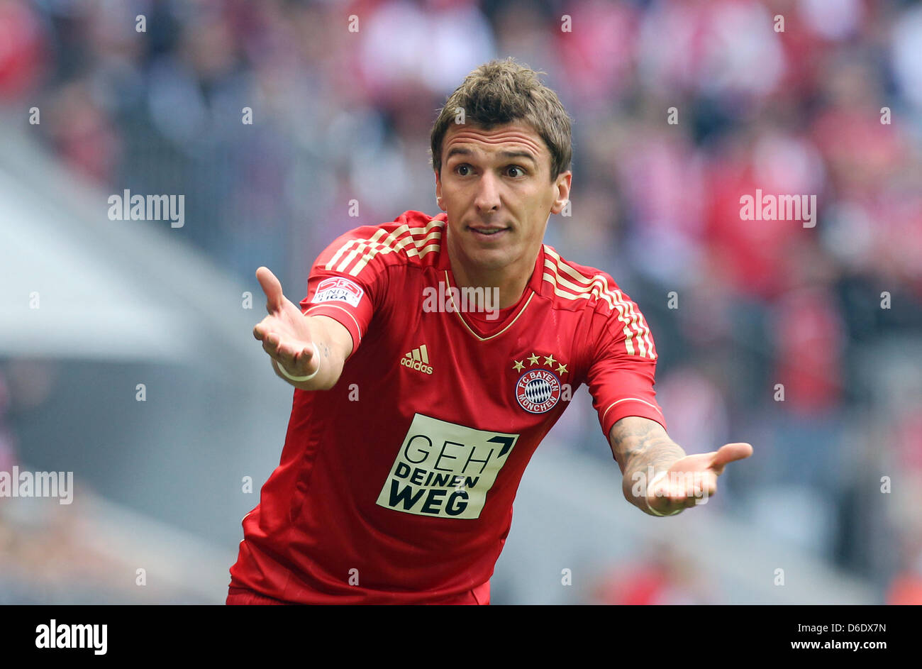 Munich's Mario Mandzukic gestures during the German Bundesliga match ...