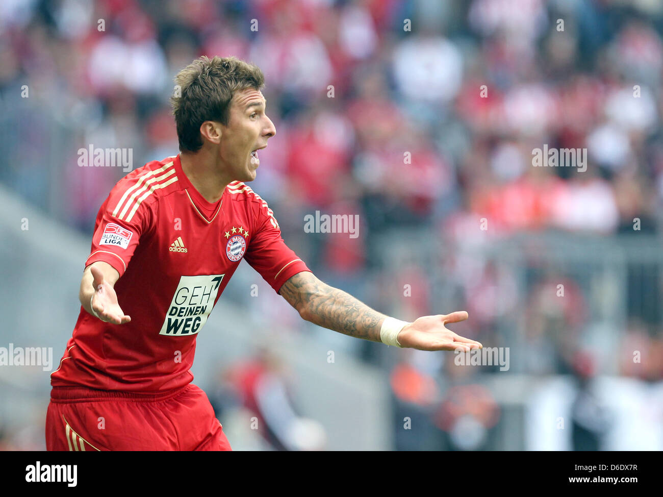 Munich's Mario Mandzukic gestures during the German Bundesliga match ...