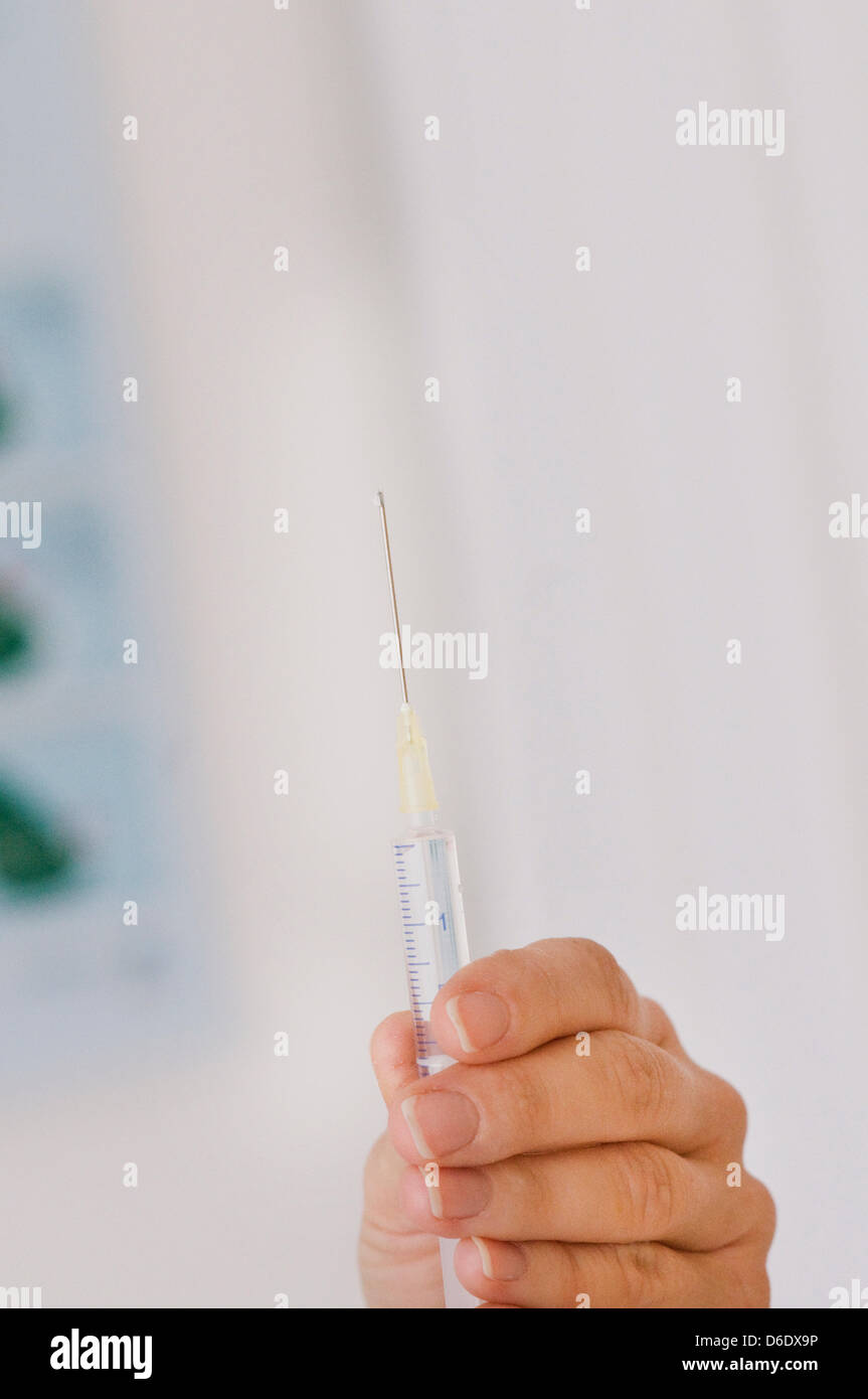 A doctor holds a syringe at a GP practice in Waiblingen, Germany, 10 ...