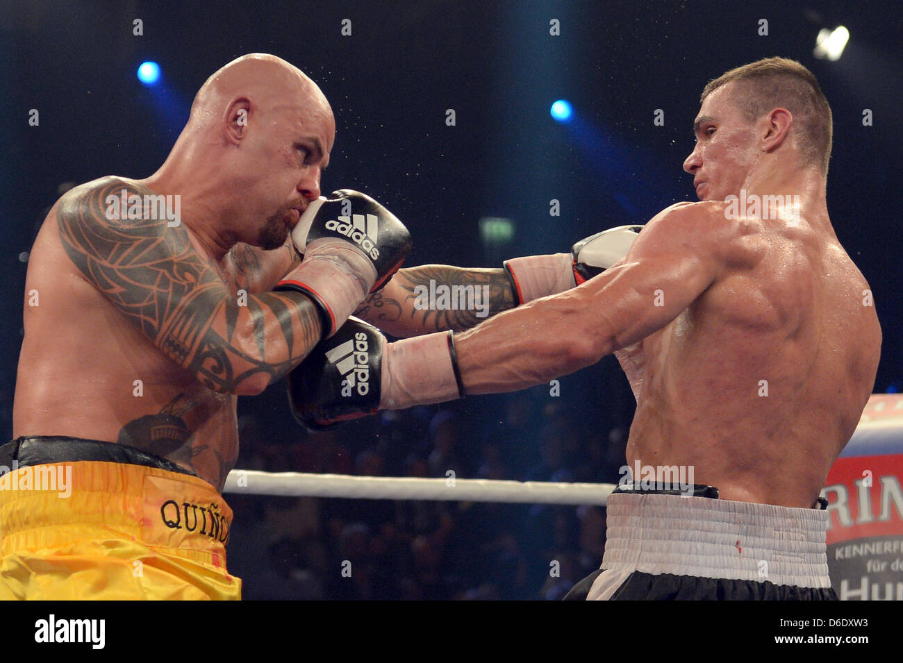 Spanish cruiserweight boxer David Quinonero (L) fights with Polish ...
