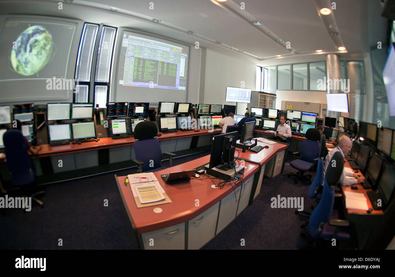 ESA Employees are at work in a control room of the European Space ...