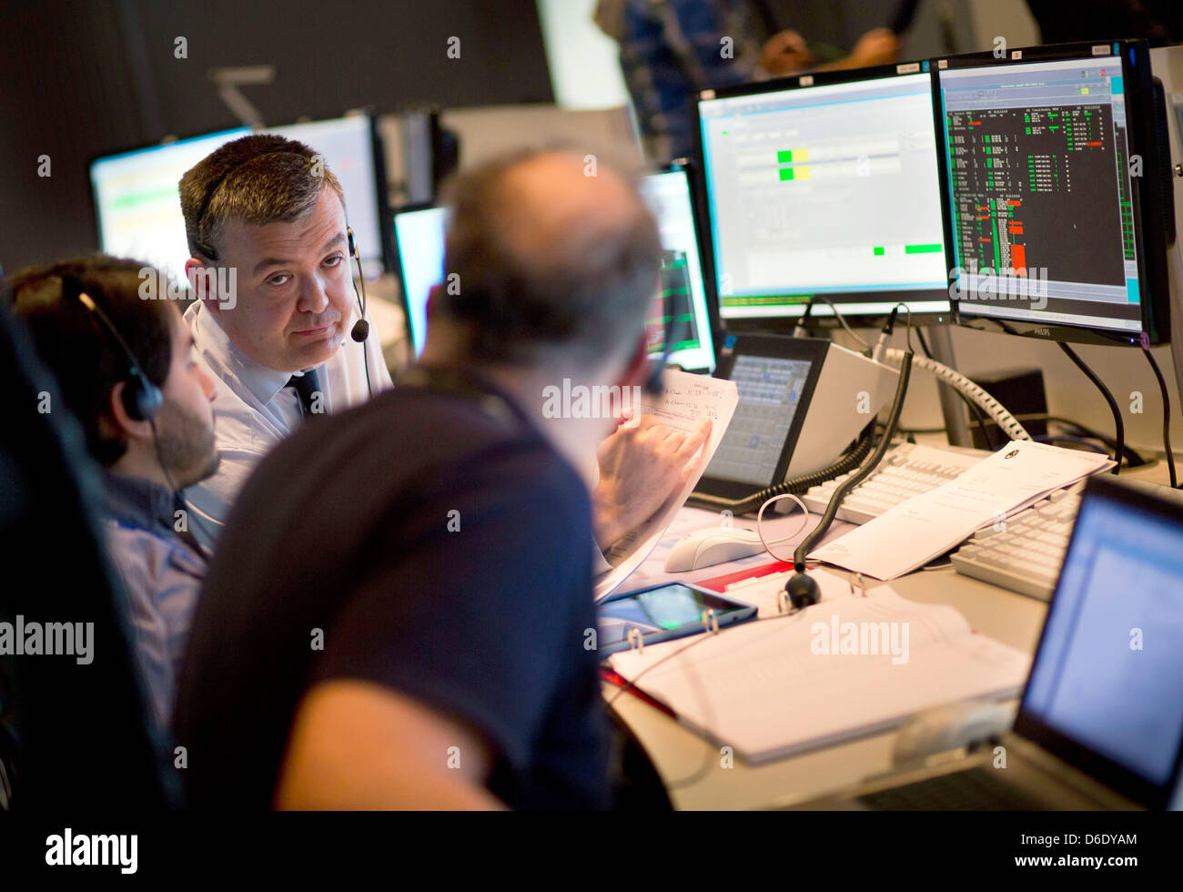 ESA Employees are at work in a control room of the European Space ...