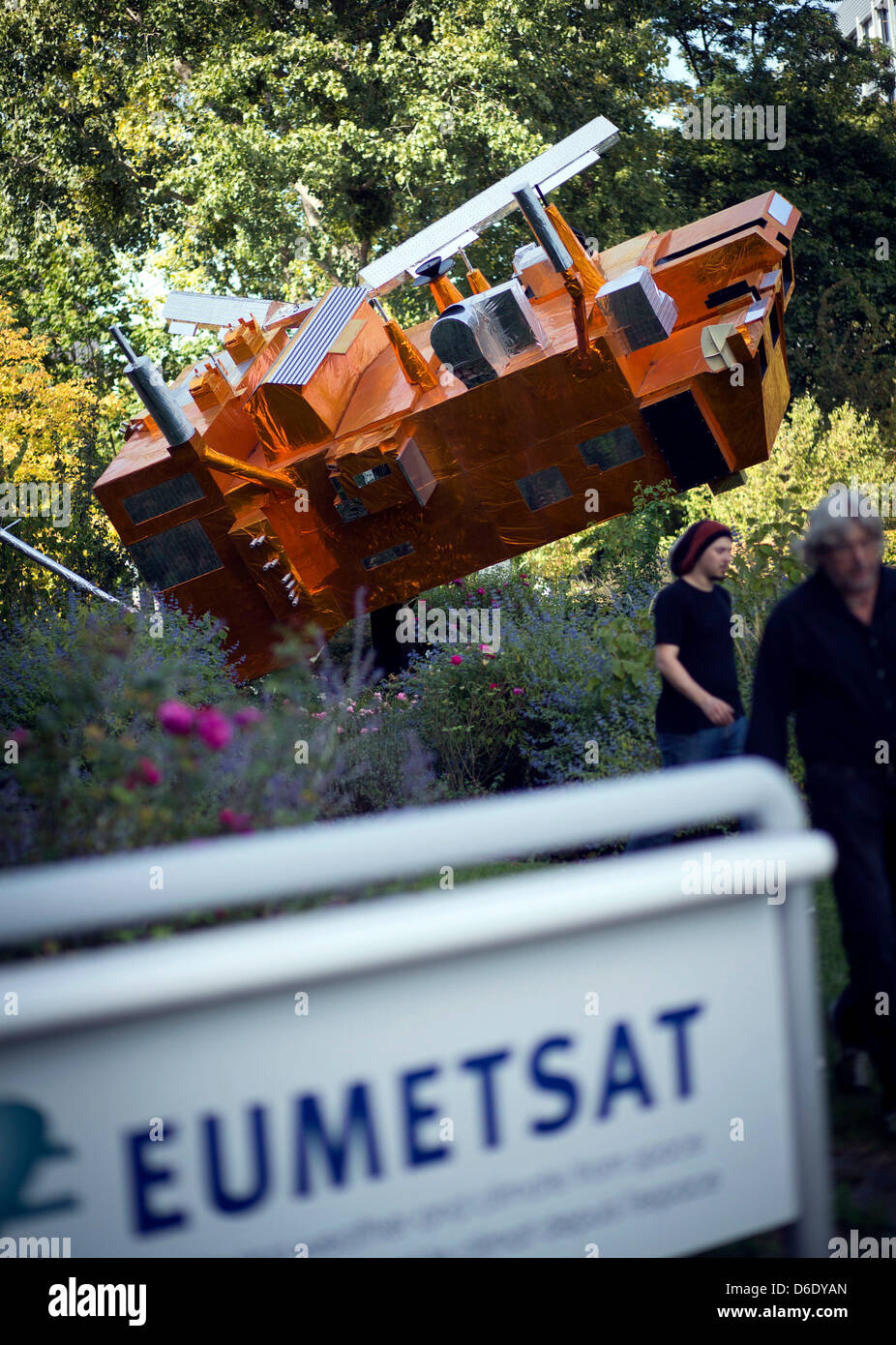 A 1-1 model of European weather satellite Metop-B is on display outside ...