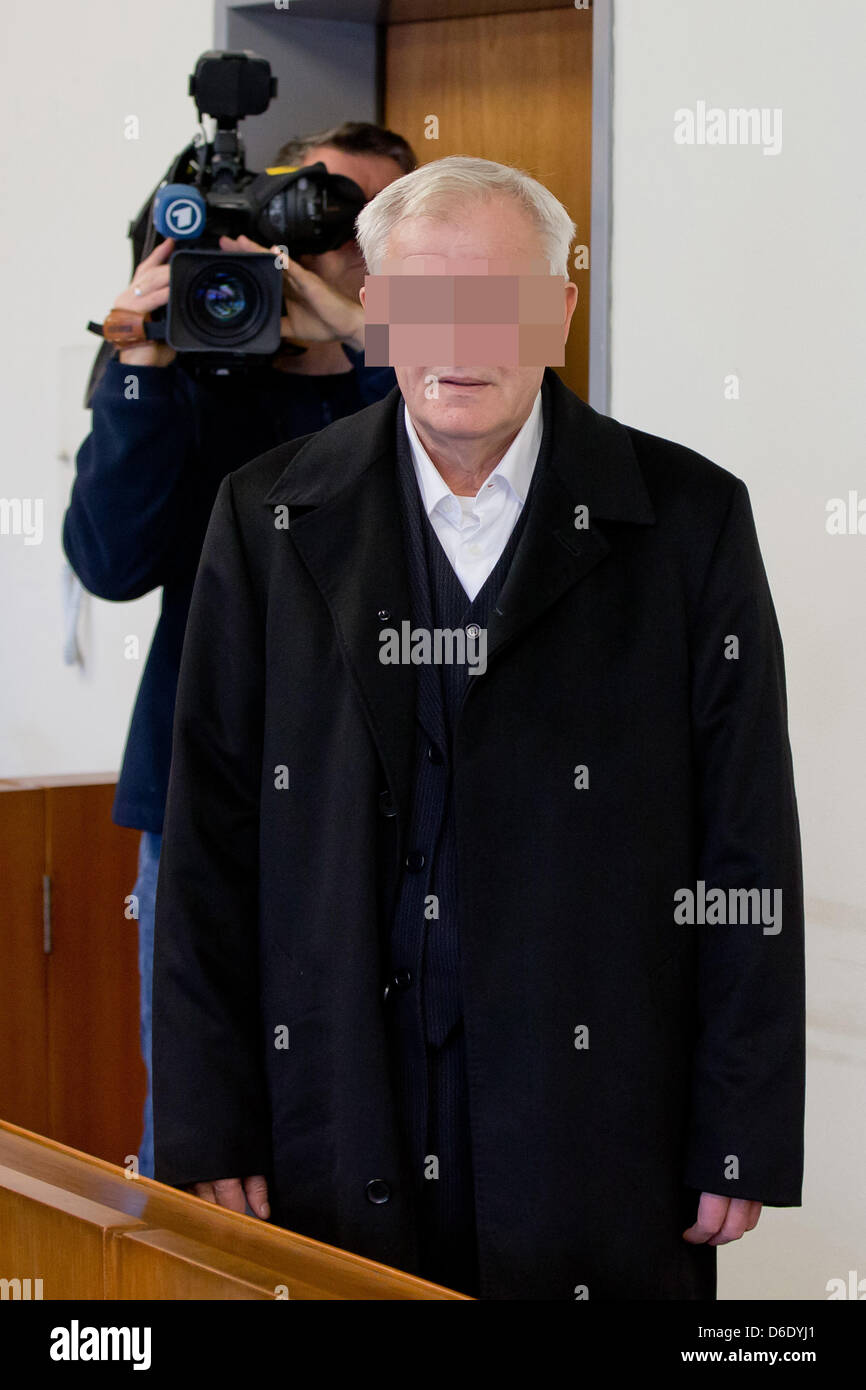 Defendant Srecko K. arrives for the start of the trial at the regional ...