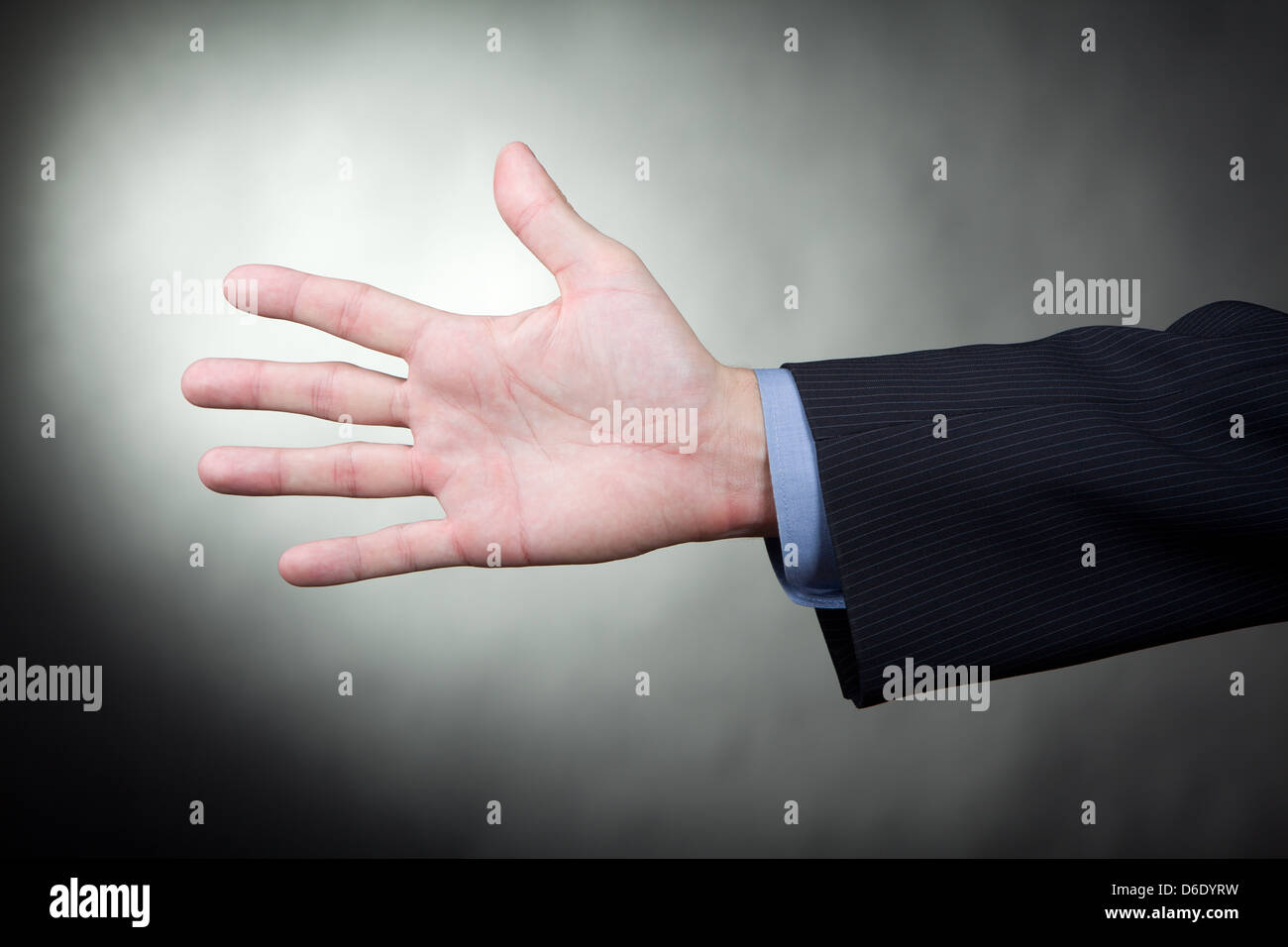 Man showing his palm Stock Photo - Alamy