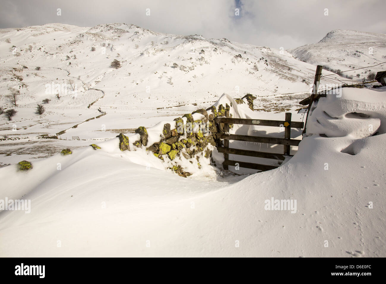 Helvellyn plastered in snow during the extreme winter weather during ...