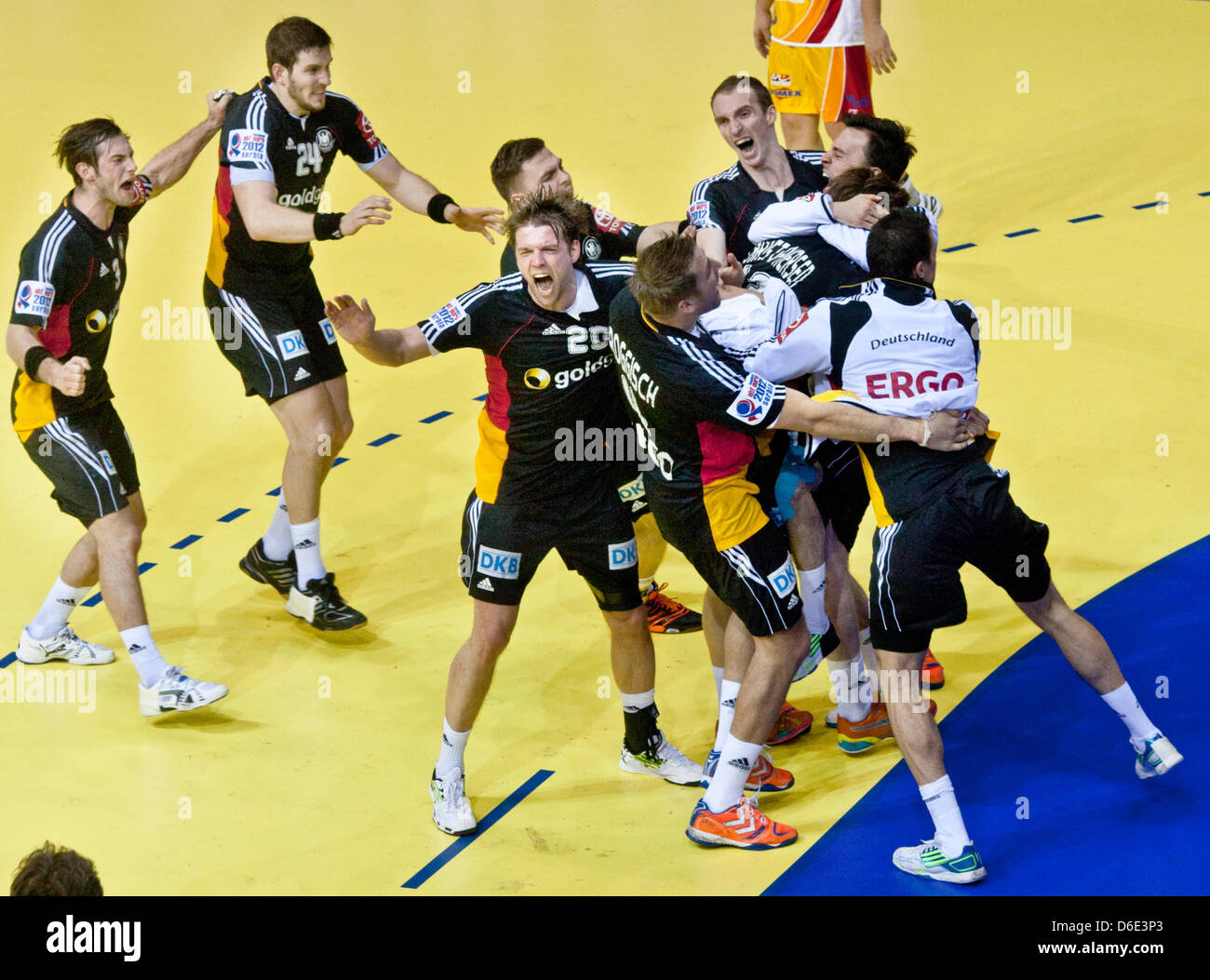 Germany's team celebrates its 23-24 victory after the Handball European ...