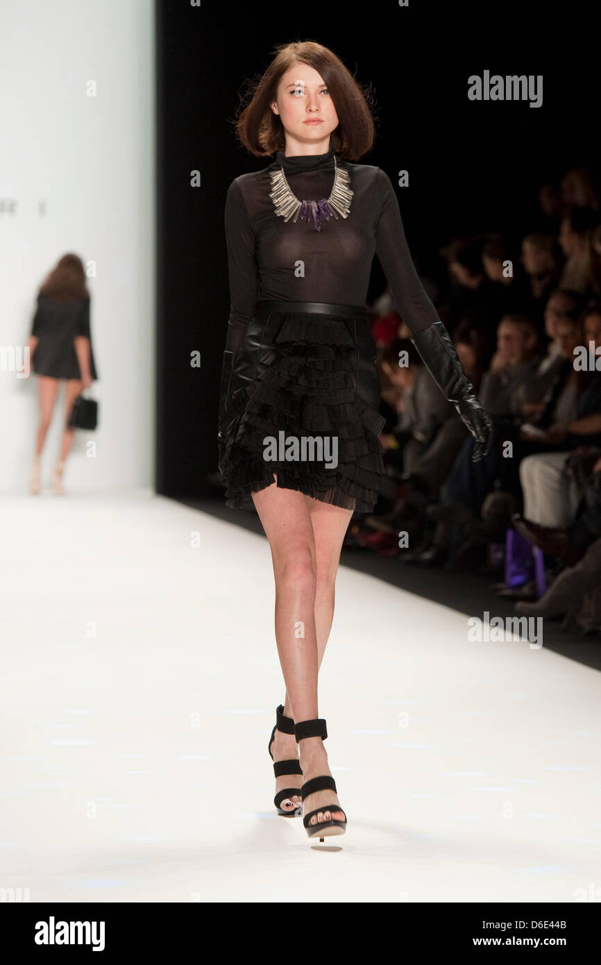 A model presents a creation at the Dimitri show during the Mercedes ...