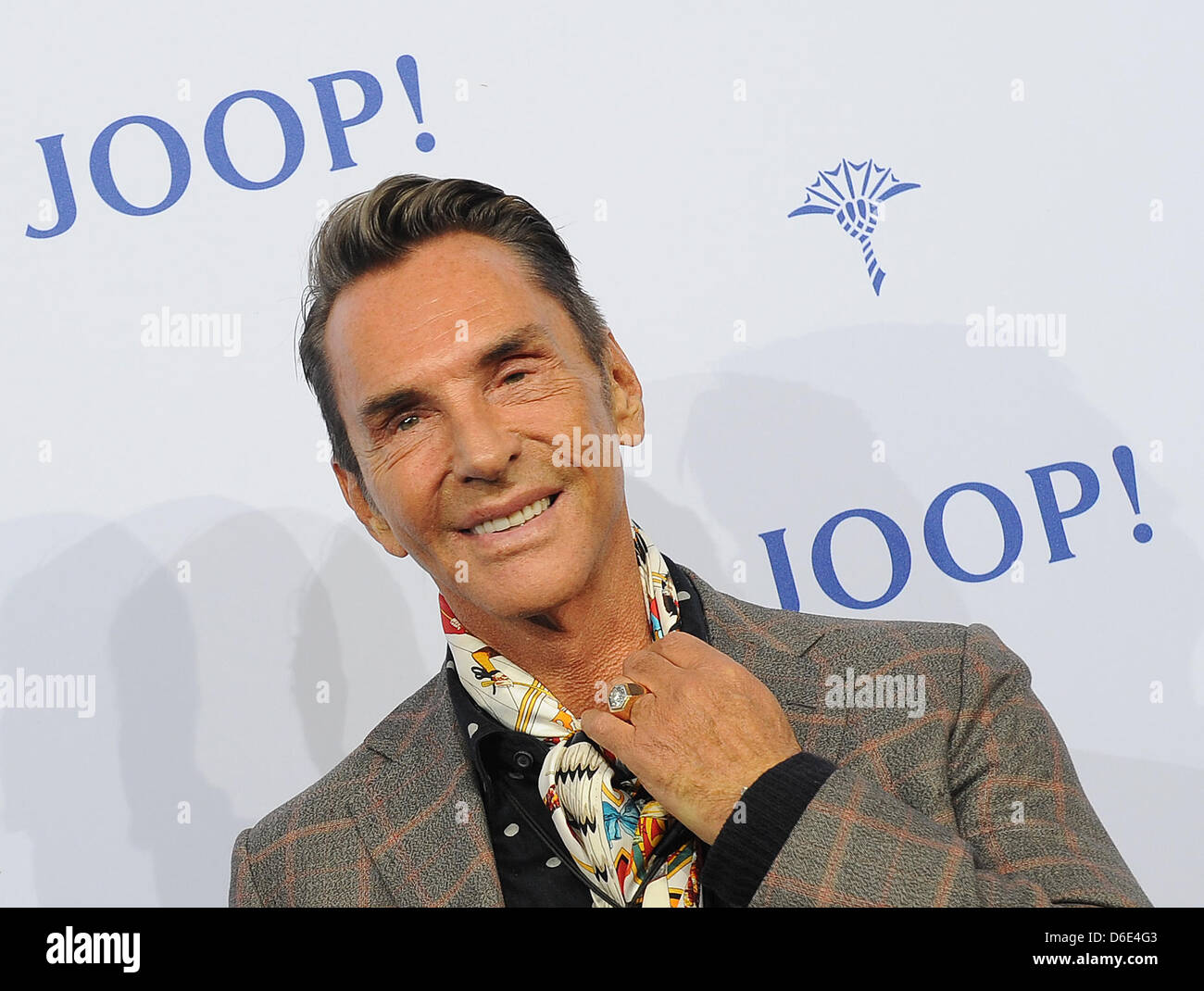 Designer Wolfgang Joop arrives at the Joop presentation during Fashion ...