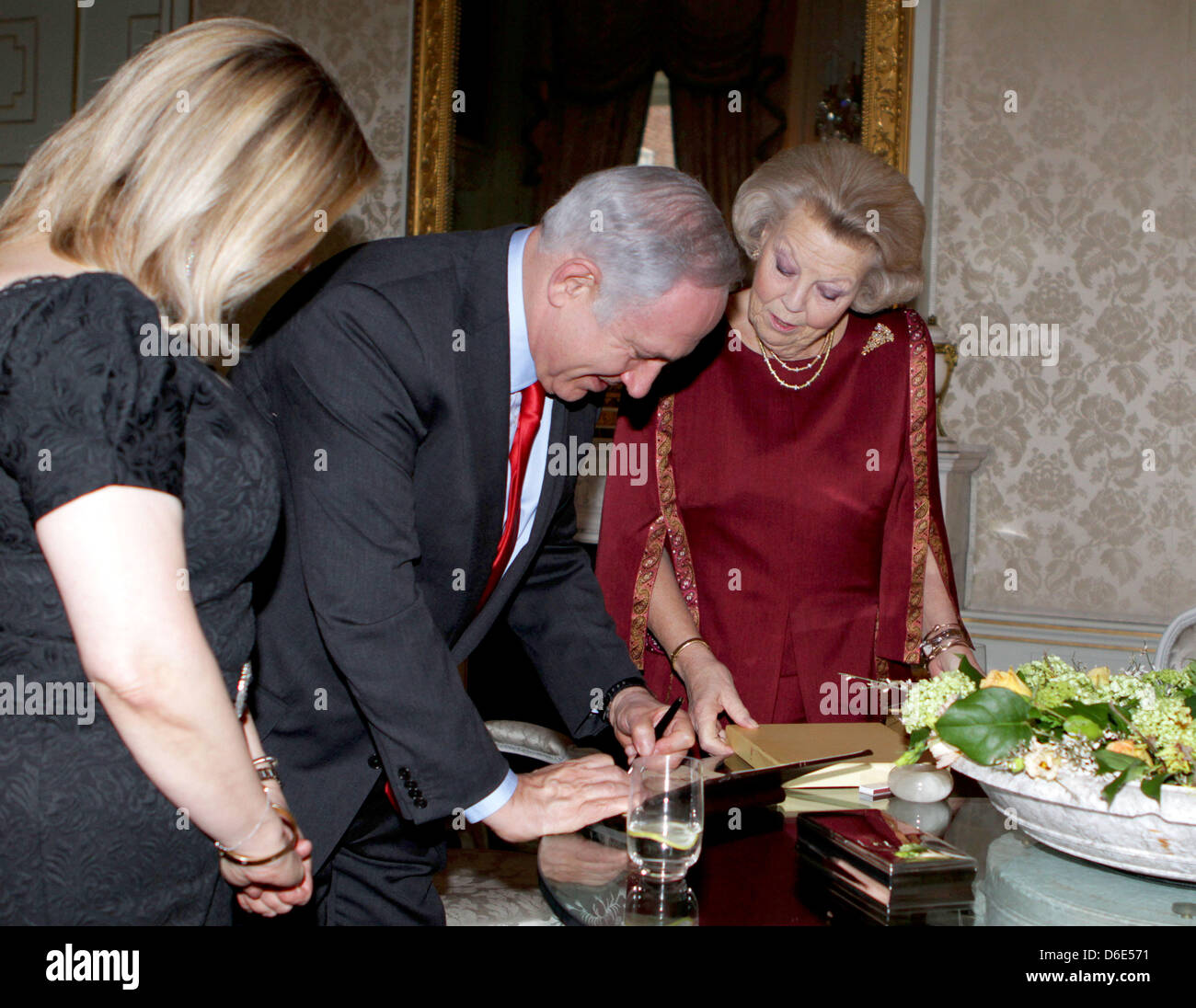 Israel's Prime Minister Benjamin Netanyahu (C) and his wife Sara (L ...