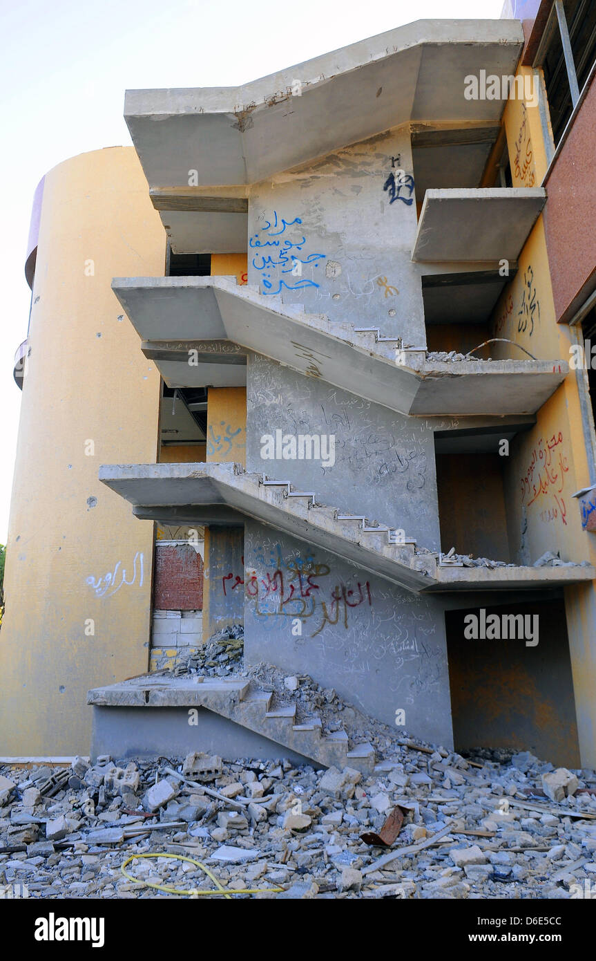 A view of the destroyed remains of an office building in the Bab al ...
