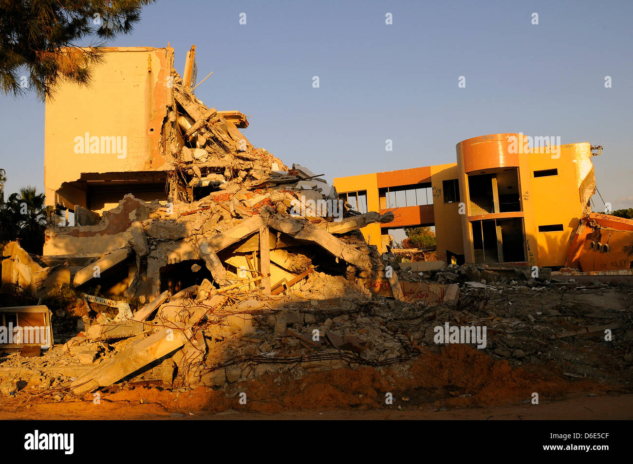 A view of the destroyed remains of an office building in the Bab al ...