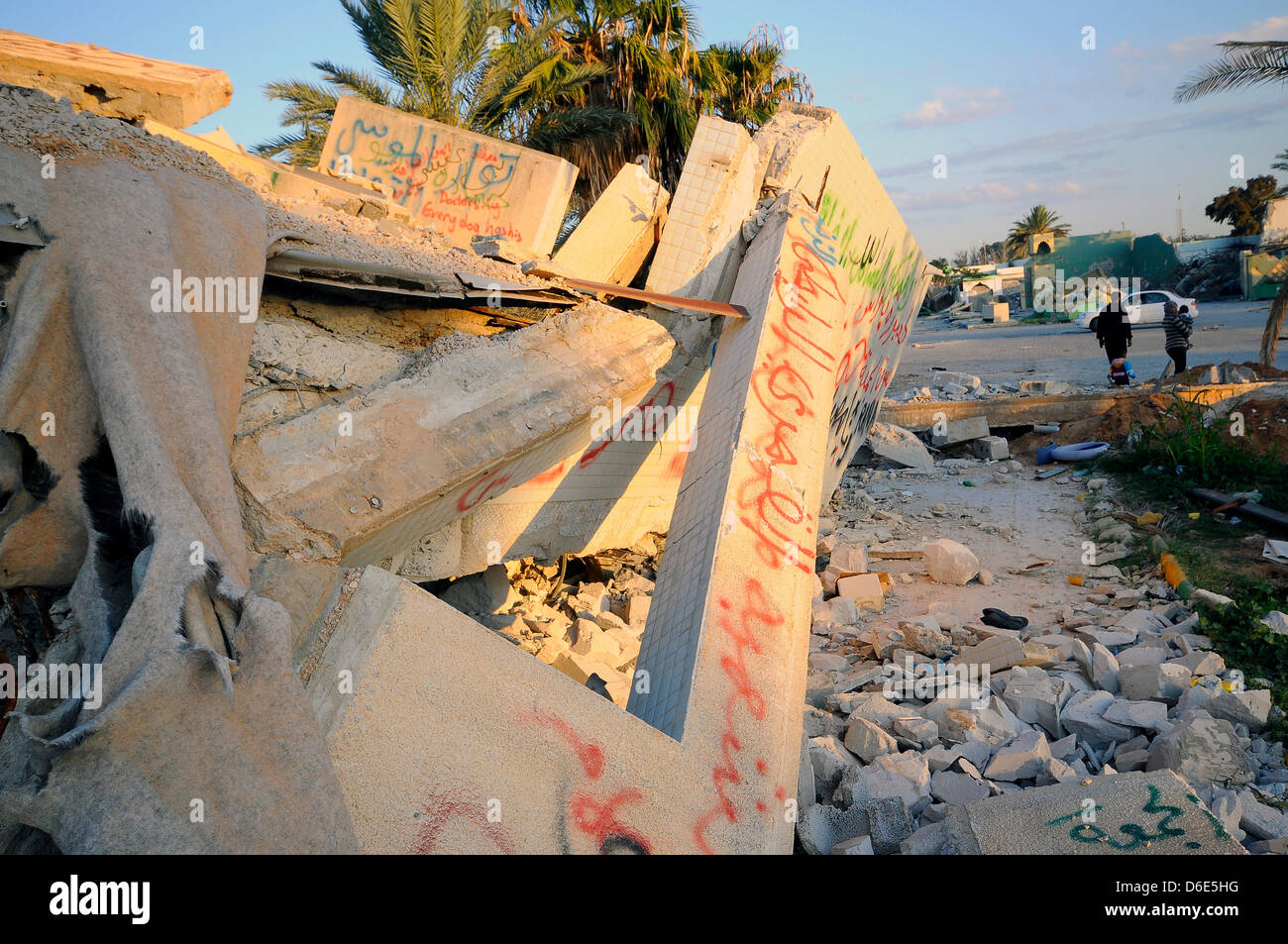 A view of a destroyed wall of an office building in the Bab al-Azizia ...