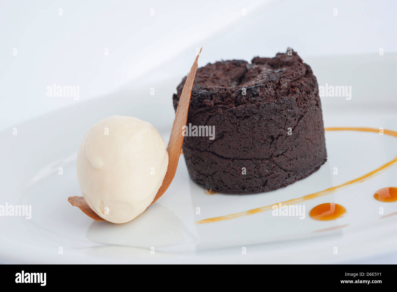 Chocolate fondant with Jack Daniels' ice cream and a blood orange ...