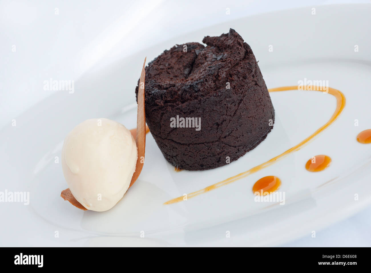 Chocolate fondant with Jack Daniels' ice cream and a blood orange ...