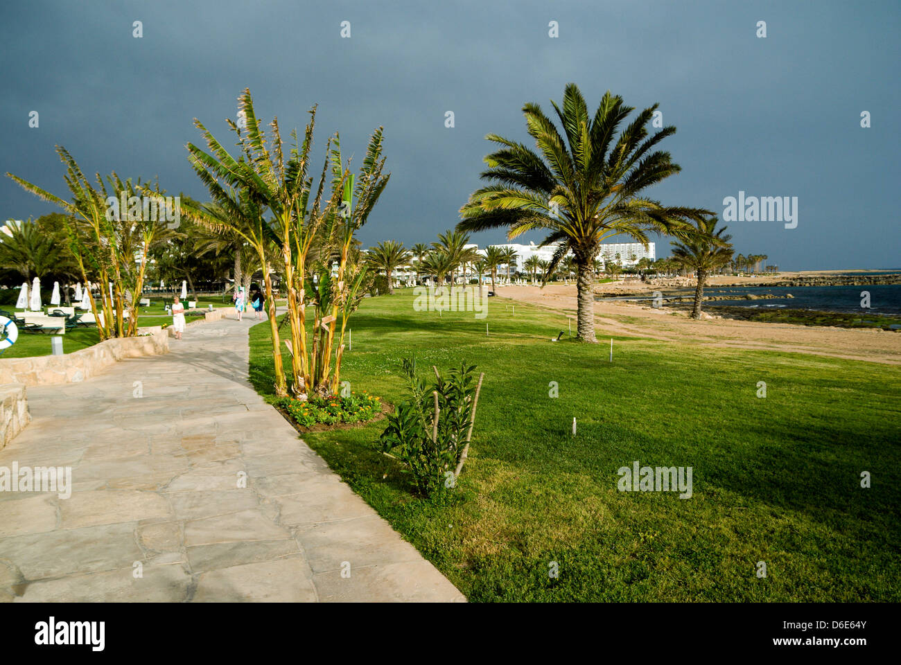 Dark clouds over beach hi-res stock photography and images - Alamy