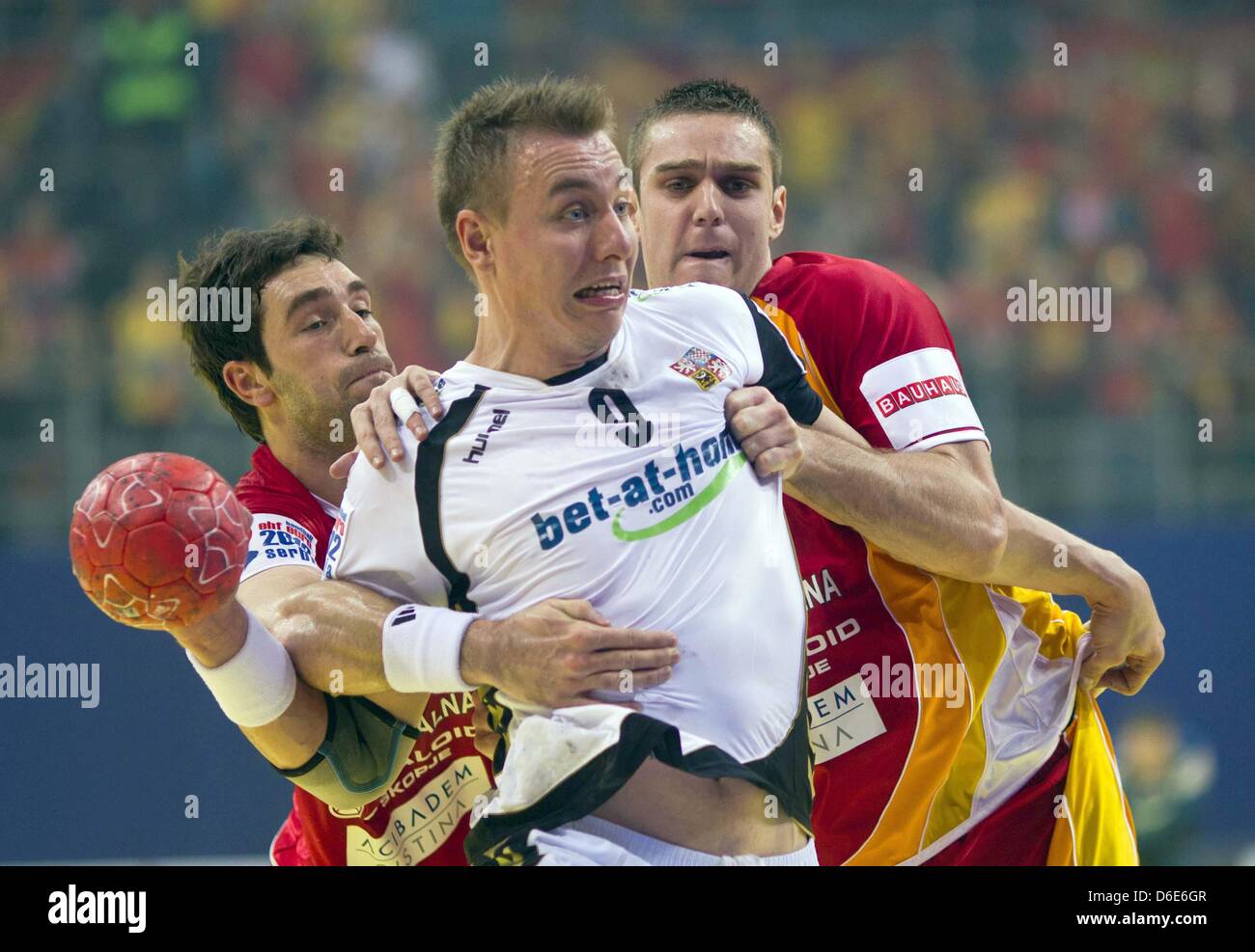 Czech player Filip Jicha (C) tries to score a goal against Mecedonia's ...