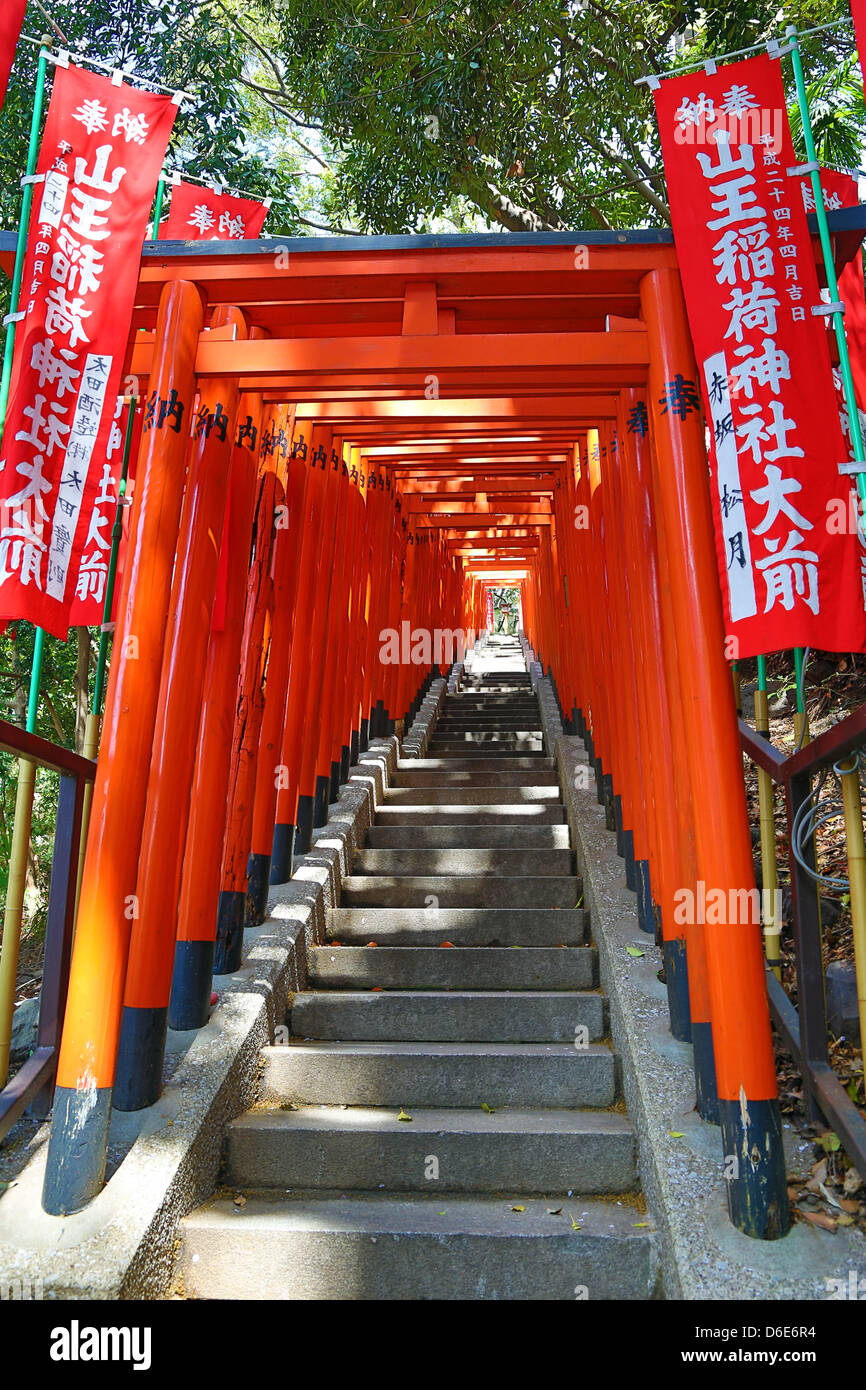 Red Torii gates and steps to the entrance to the Hie-Jinja Shinto ...