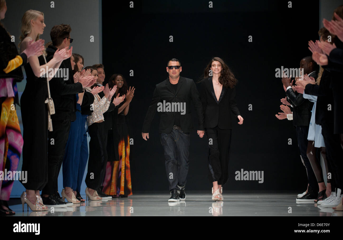 Designer Michael Michalsky and models present a creation of Michalsky ...