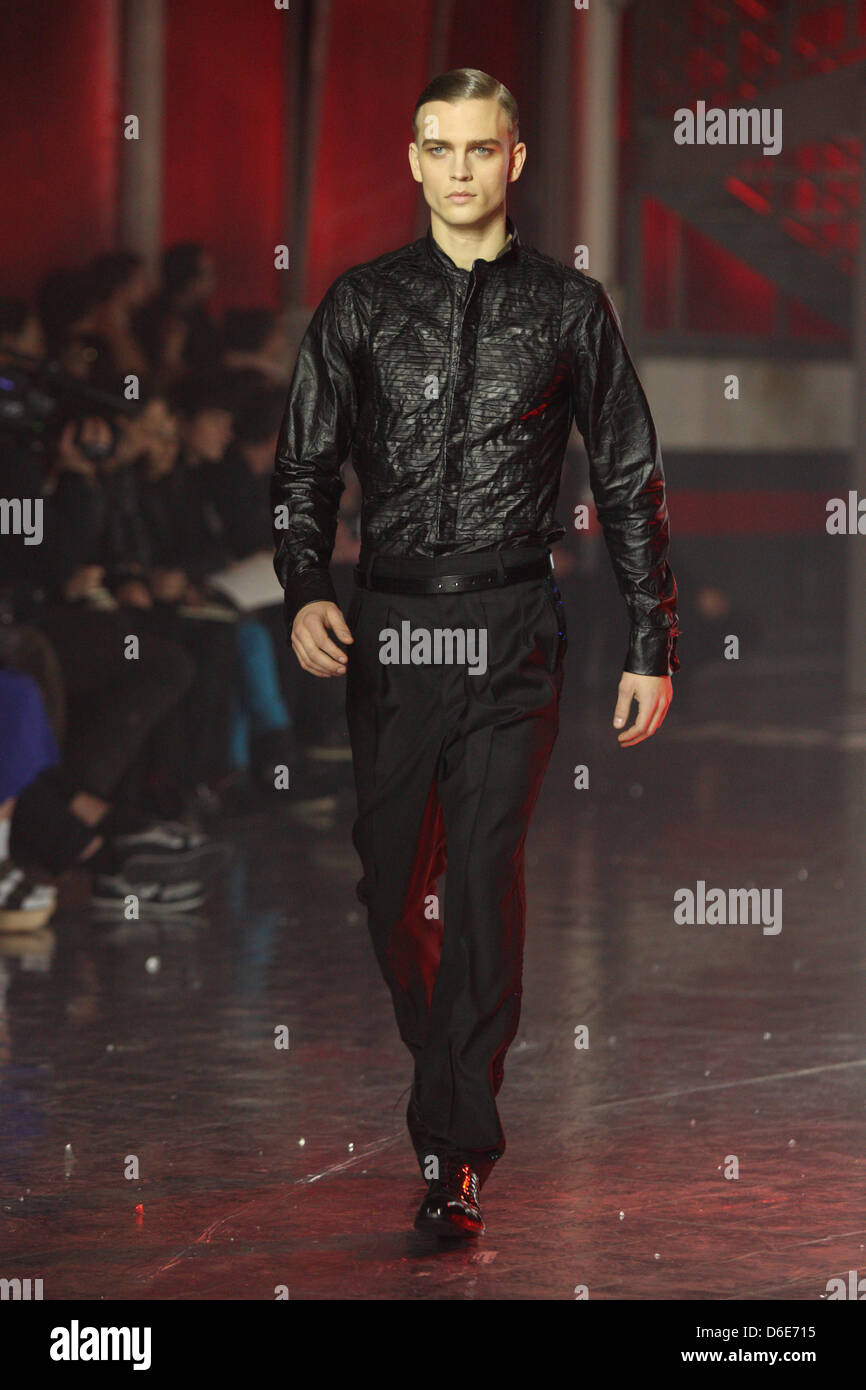 A model wears a creation by British designer Bill Gaytten as part of ...