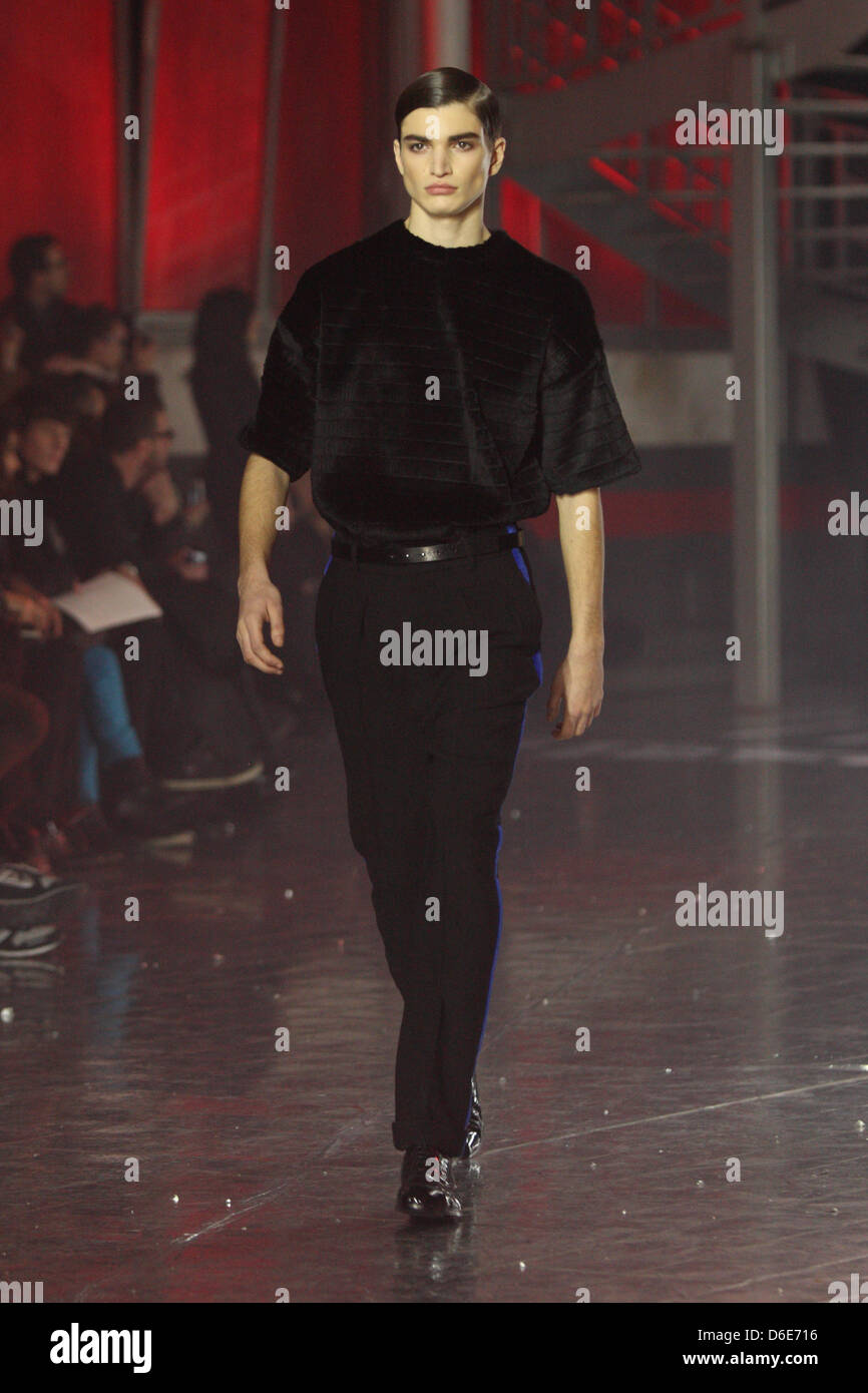 A model wears a creation by British designer Bill Gaytten as part of ...