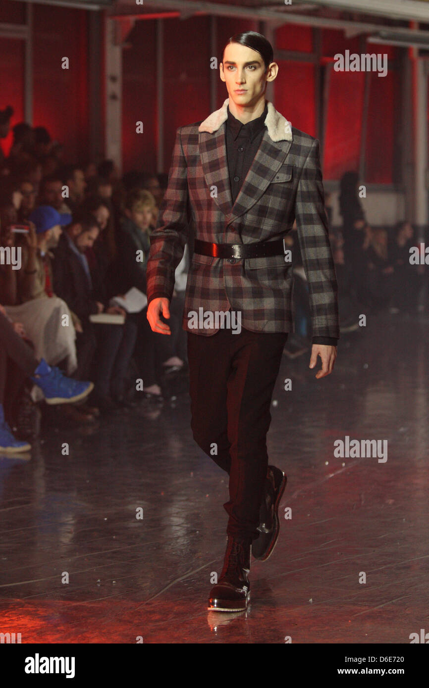 A model wears a creation by British designer Bill Gaytten as part of ...