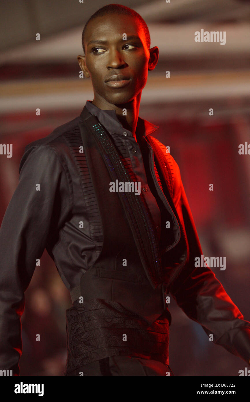 A model wears a creation by British designer Bill Gaytten as part of ...