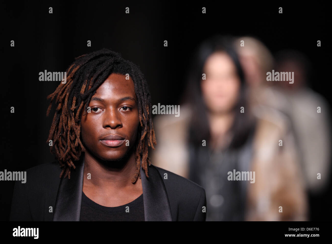 Models wear a creation by Maison Martin Margiela as part of the fall ...