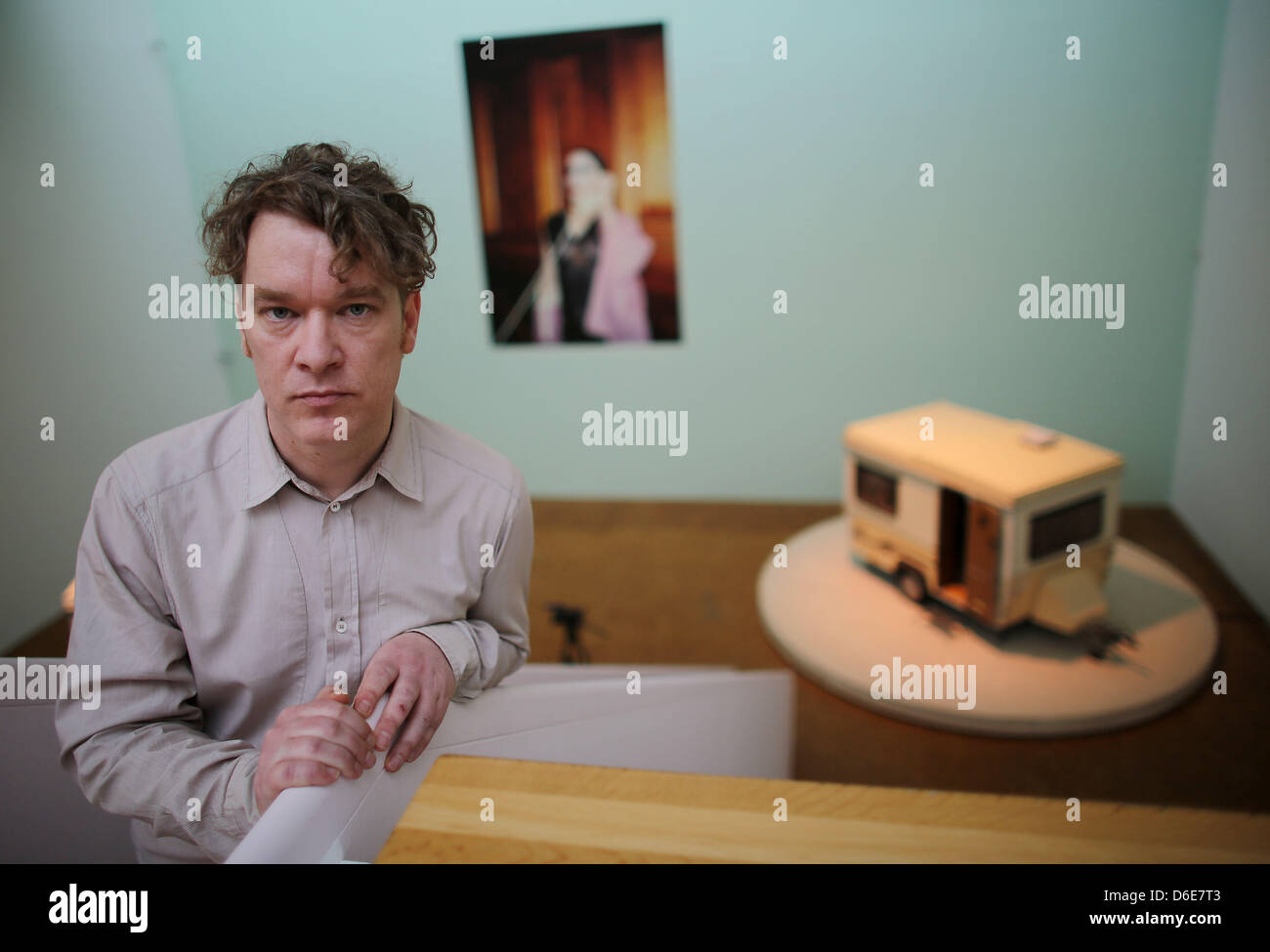 Artist Phil Collins poses next to his works in Cologne, Germany, 17 ...