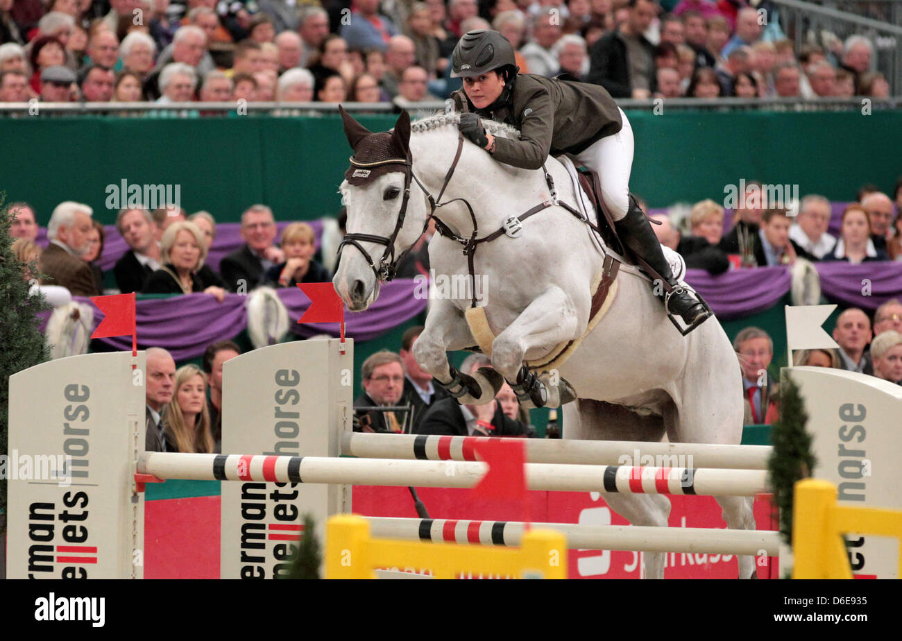 German show jumper Katrin Eckermann jumps with her horse Carlson at the ...