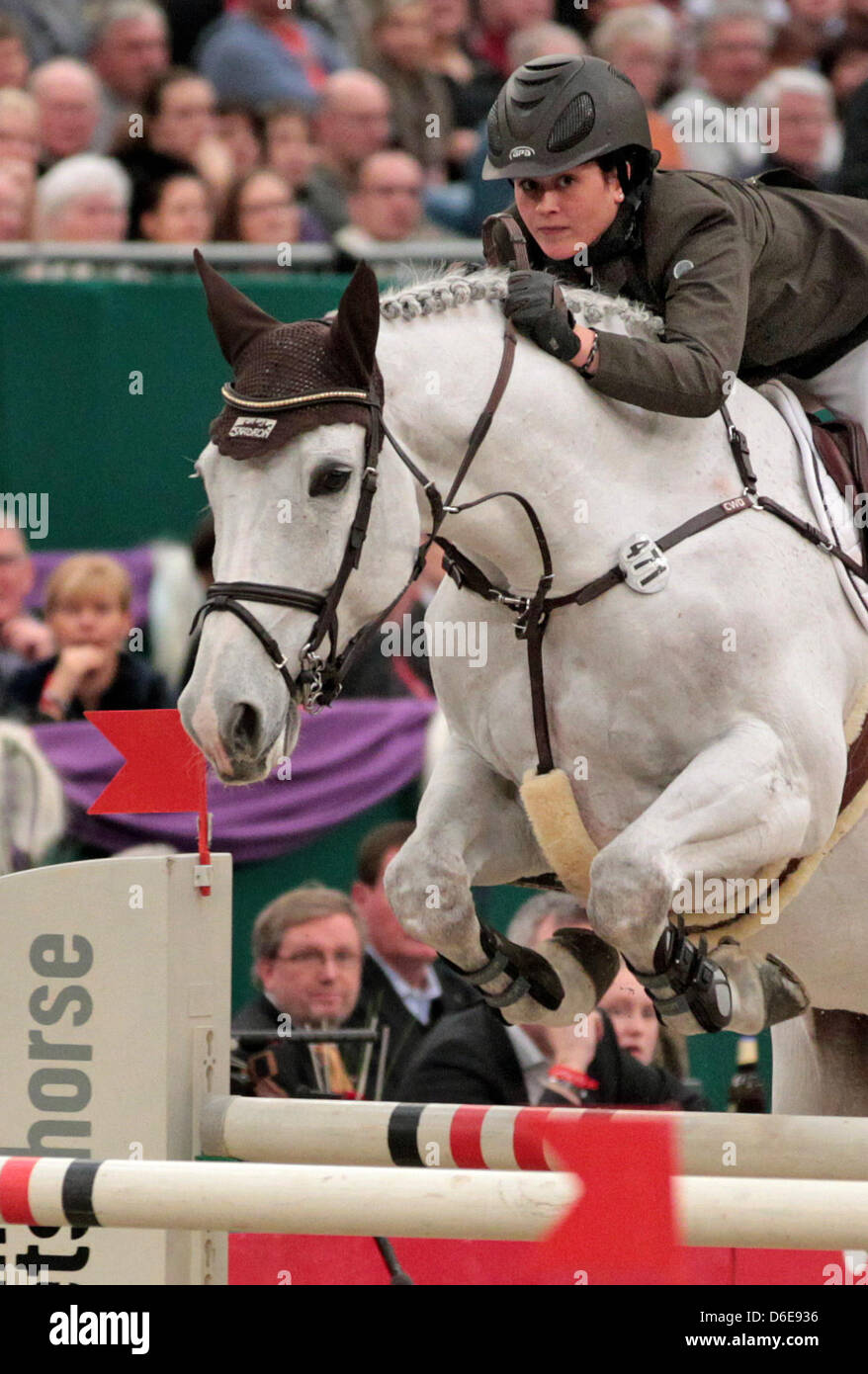 German show jumper Katrin Eckermann jumps with her horse Carlson at the ...